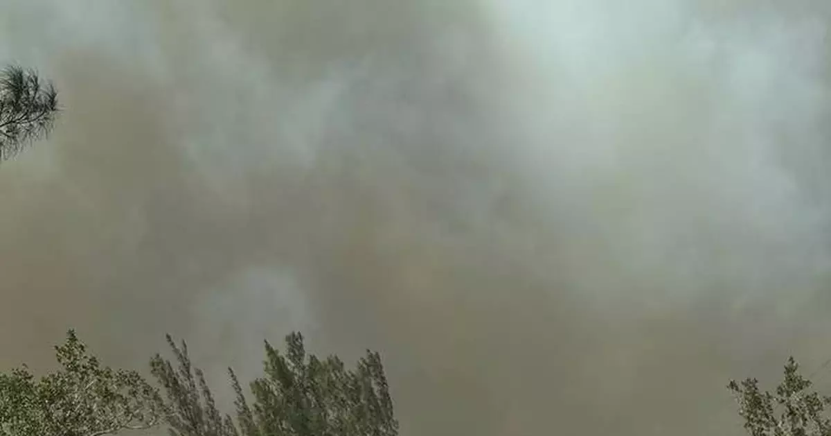 Brush fire, smoky conditions shut down road leading in and out of ...