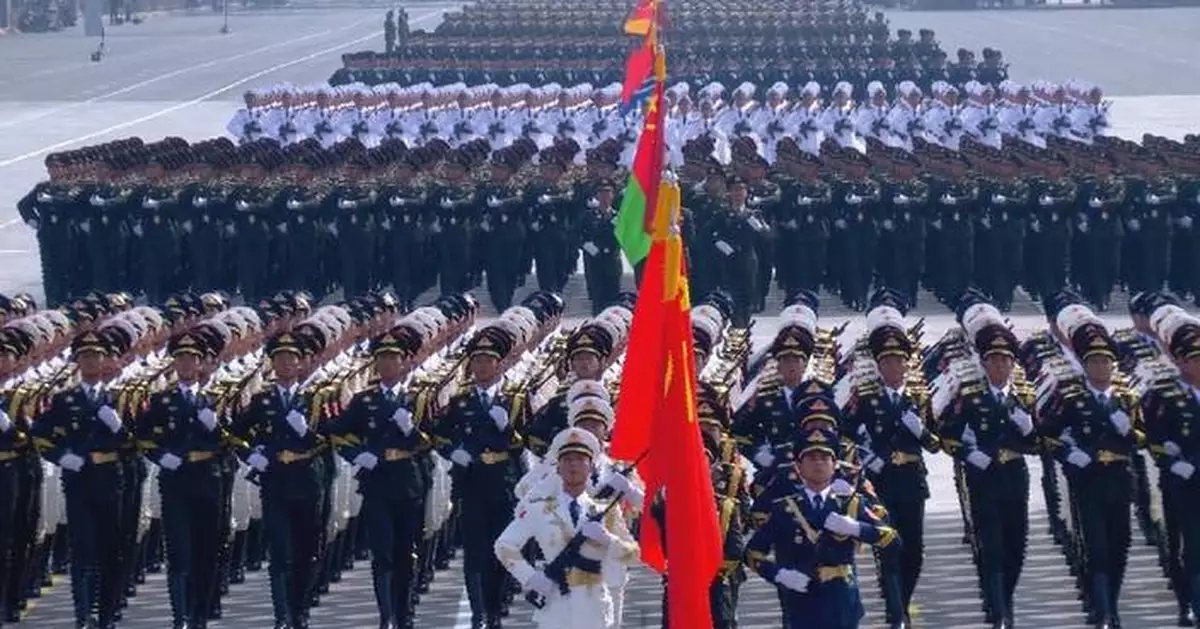 Foot formations featuring PLA's new military structure pass through ...