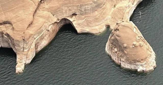 Large geological feature known as the 'Double Arch' and the 'Toilet ...