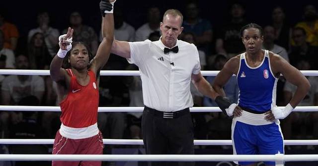 Boxer Cindy Ngamba is the refugee team's first athlete to clinch a ...