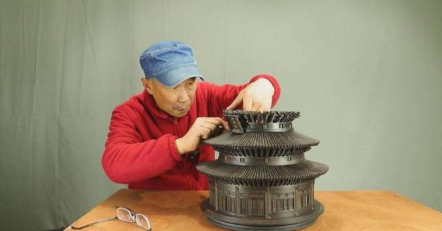 Retired engineer devoted to making replica of ancient Chinese buildings