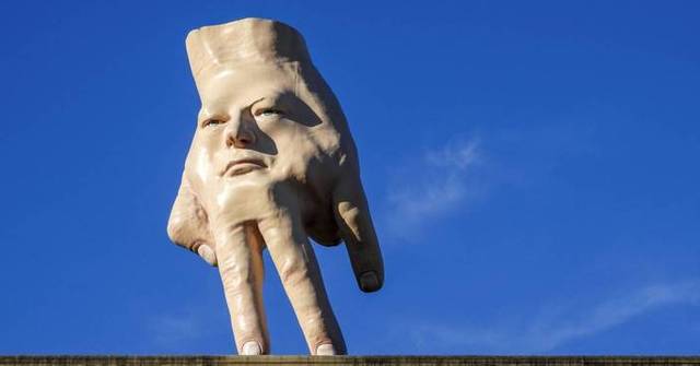 A New Zealand city waves goodbye to its 'disturbing' giant hand ...