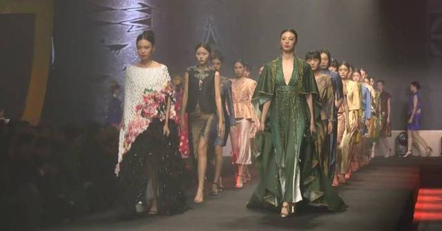 Fusion of traditional textile craftsmanship with modern fashion showcased at textile heritage ...