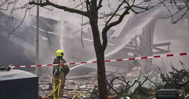 An explosion destroys an apartment block in a Dutch city, killing at ...