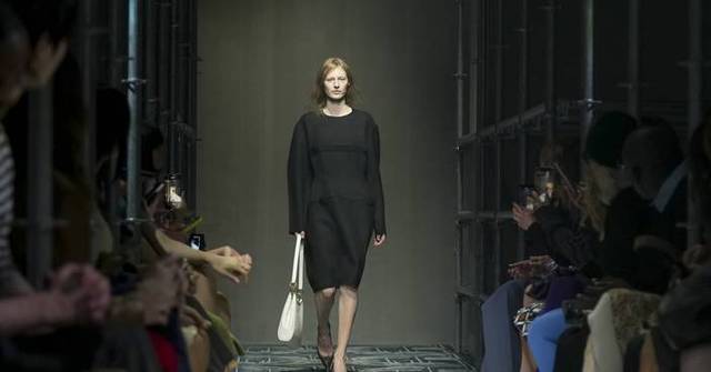 Prada reconstructs femininity starting with the little black dress fit ...