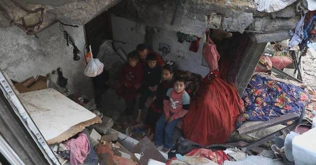 Palestinians digging through rubble for bodies of beloved ones