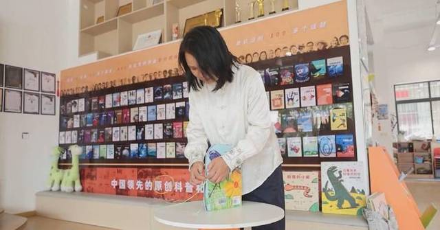 Library owner seeks to inspire young people through power of picture books
