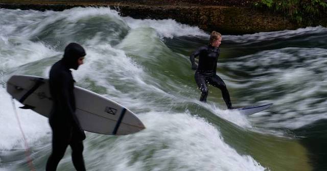 Munich's famous river wave has vanished after a cleanup. Surfers hope ...