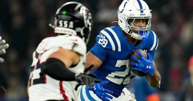 Taylor runs for 244 yards and 3 TDs for Colts in 31-25 OT win over ...