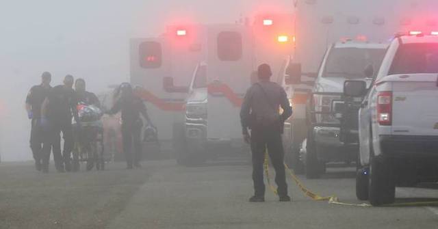 Emergency officials respond to a small plane crash near Galveston, Texas