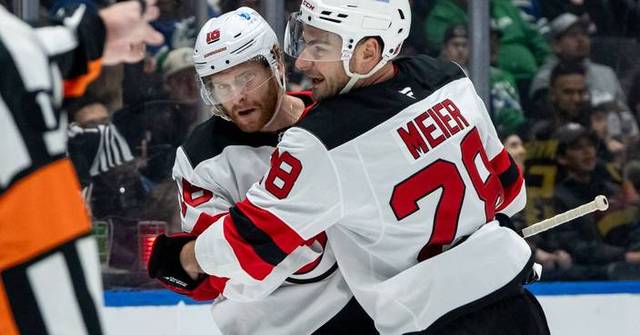 Cody Glass has 2 goals and an assist in Devils' 5-4 win over Canucks