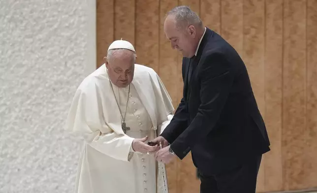 Pope Francis stumbles while walking into Jubilee audience at the ...